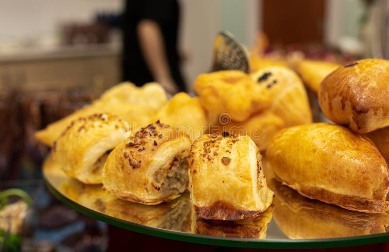 Pastry Puff Pastry with Nuts on a Plate with Desserts at the Event ...