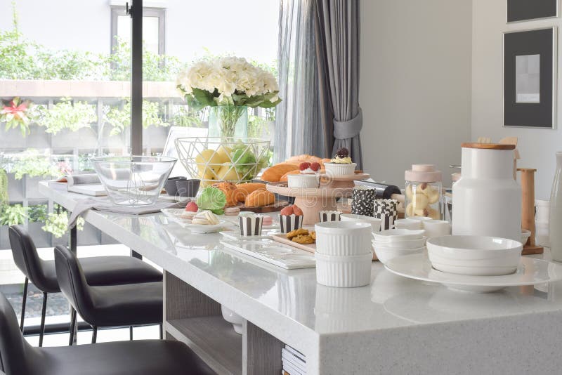 Pastry on the White Artificial Stone Top Dining Table in Modern Dining ...