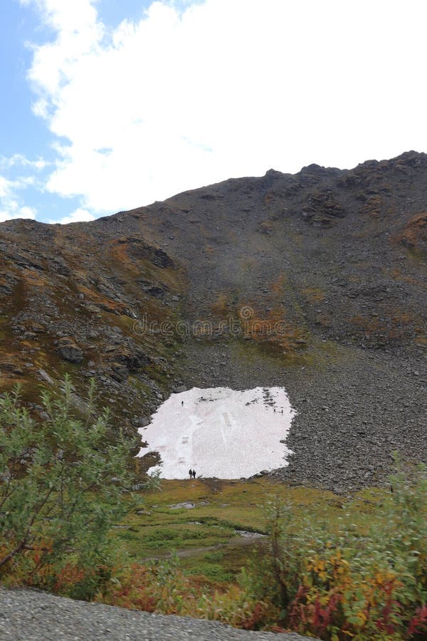 A Patch of Snow and Ice on a the Side of a Mountain Stock Photo - Image ...