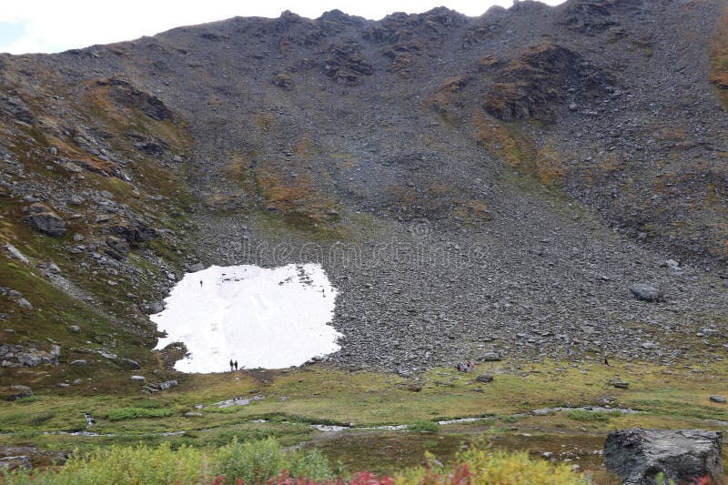 A Patch of Snow and Ice on a the Side of a Mountain Stock Photo - Image ...