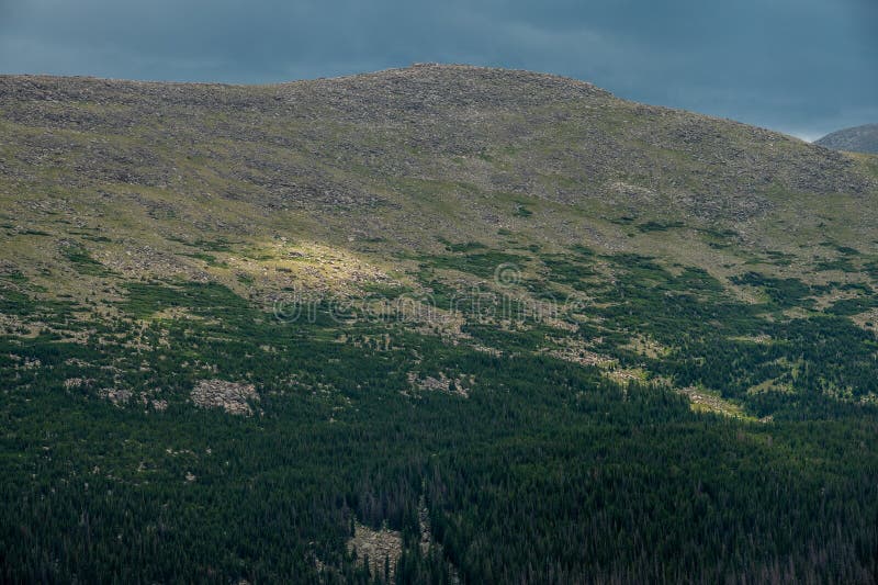 Patch of Sunlight Breaks through the Clouds To Light the Hills Side ...