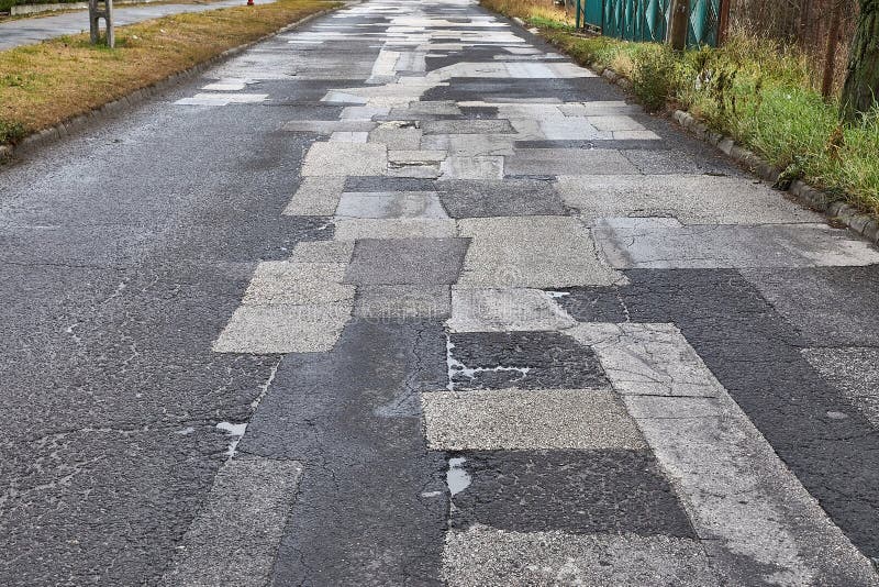 Patched broken road stock image. Image of decadence - 231796519