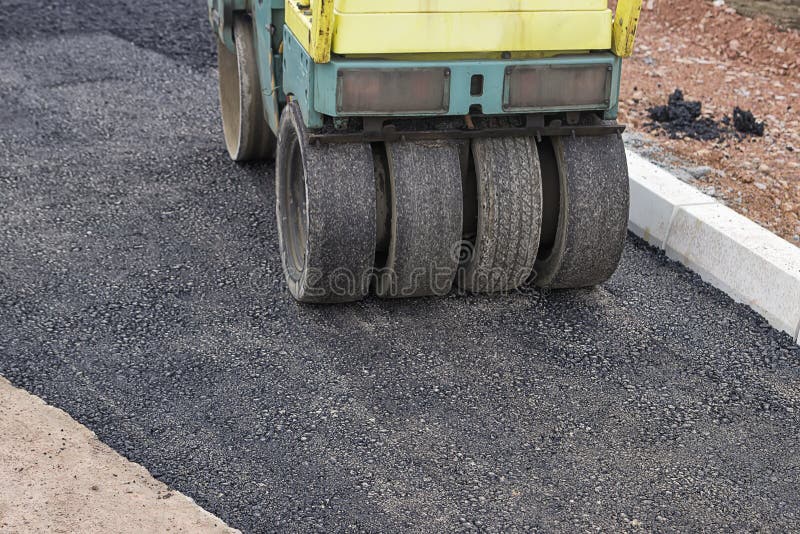 Patching Asphalt at Road Construction Site Stock Image - Image of site ...