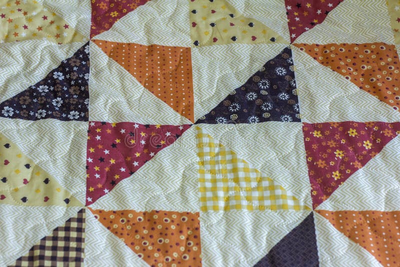 Patchwork. a Fragment of a Patchwork Quilt As a Background. Colored ...