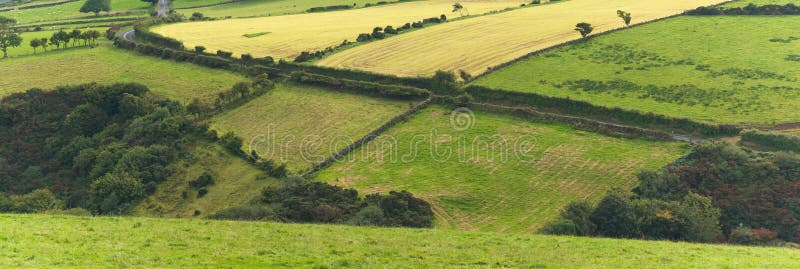 Patchwork of green fields stock photo. Image of winding - 19818764