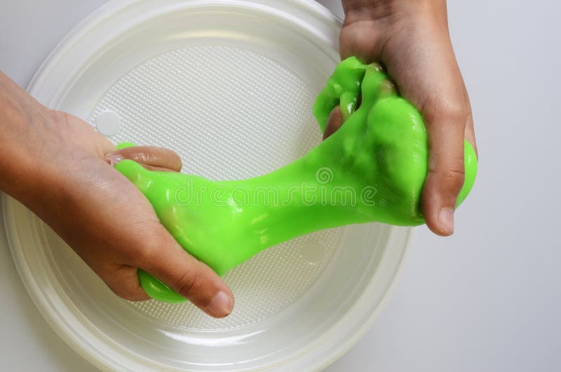 Pate Slime Elastic and Viscous on Child`s Hand Stock Photo - Image of ...