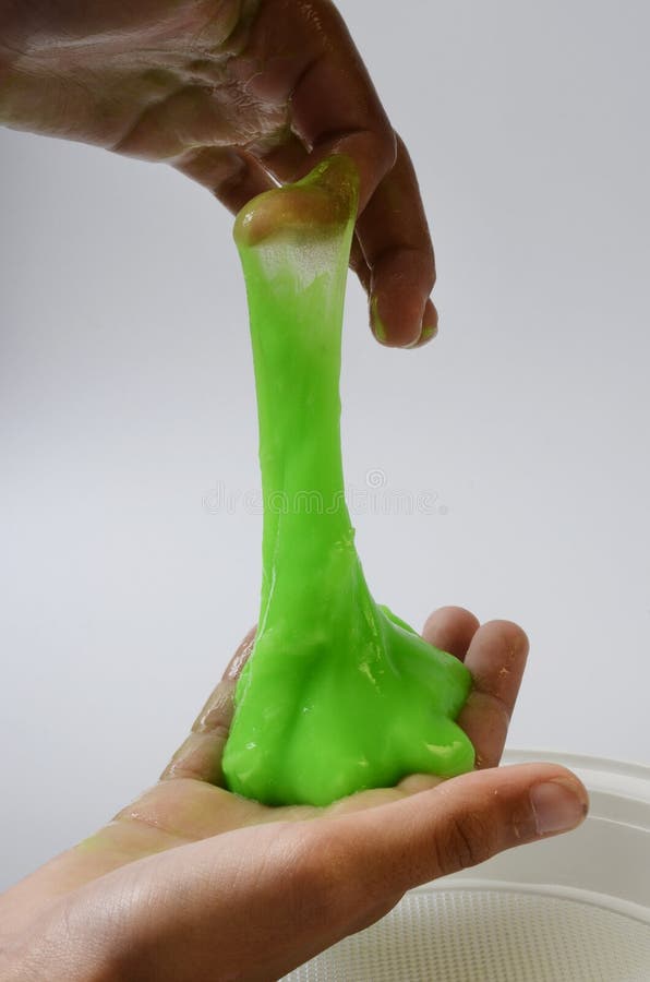 Pate Slime Elastic and Viscous on Child`s Hand Stock Photo - Image of ...