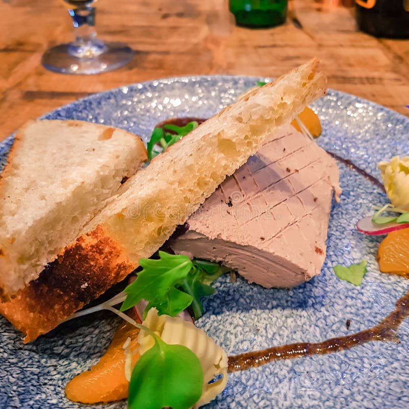 Pate on Toast on a Plate with Pat of Butter and Garnish Stock Photo ...