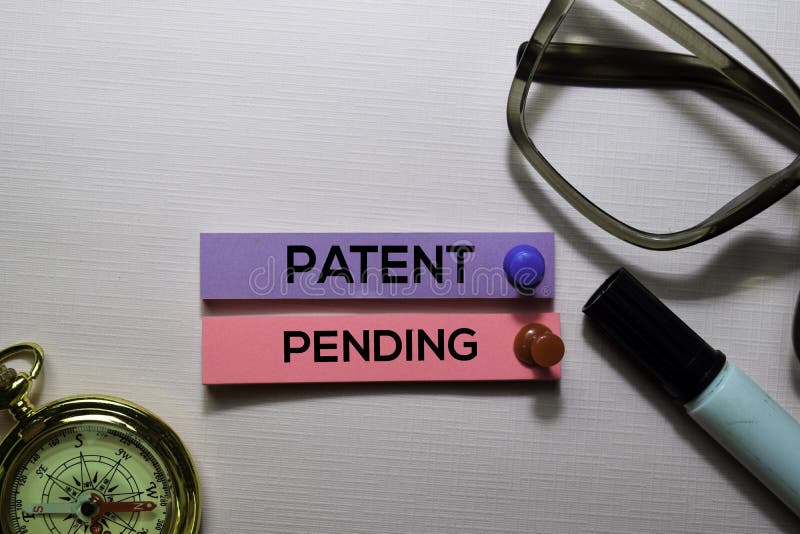 Patent Pending Text on Sticky Notes Isolated on Office Desk Stock Image ...