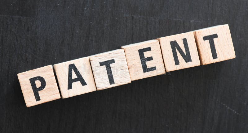 PATENT Word Made with Wooden Blocks Stock Image - Image of european ...