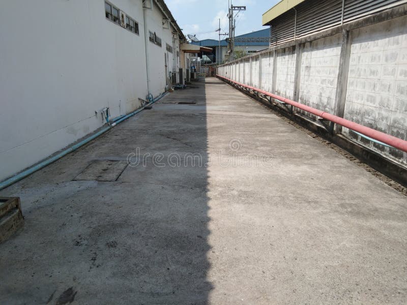 Path behind the building stock photo. Image of walkway - 181732996