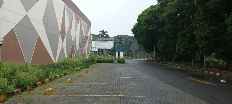 A Path between Buildings and Beautiful Trees Stock Photo - Image of ...