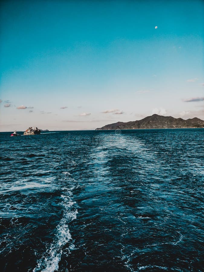 A path of cargo ship stock image. Image of shore, reflection - 206824093