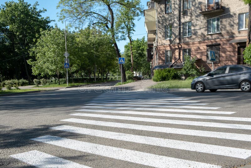 Path of Crosswalk on the Road. Car Crossing a Crosswalk Stock Image ...