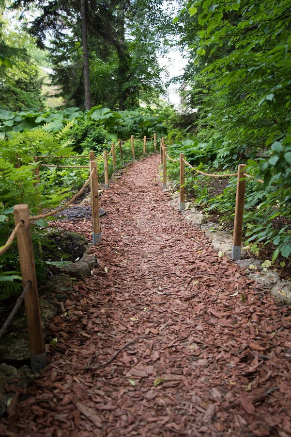 Path in the Garden. the Path is Paved with Wood Chips Stock Image ...