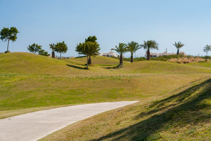 Path Going through Golf Course in Spain with Clear Blue Sky Stock Image ...