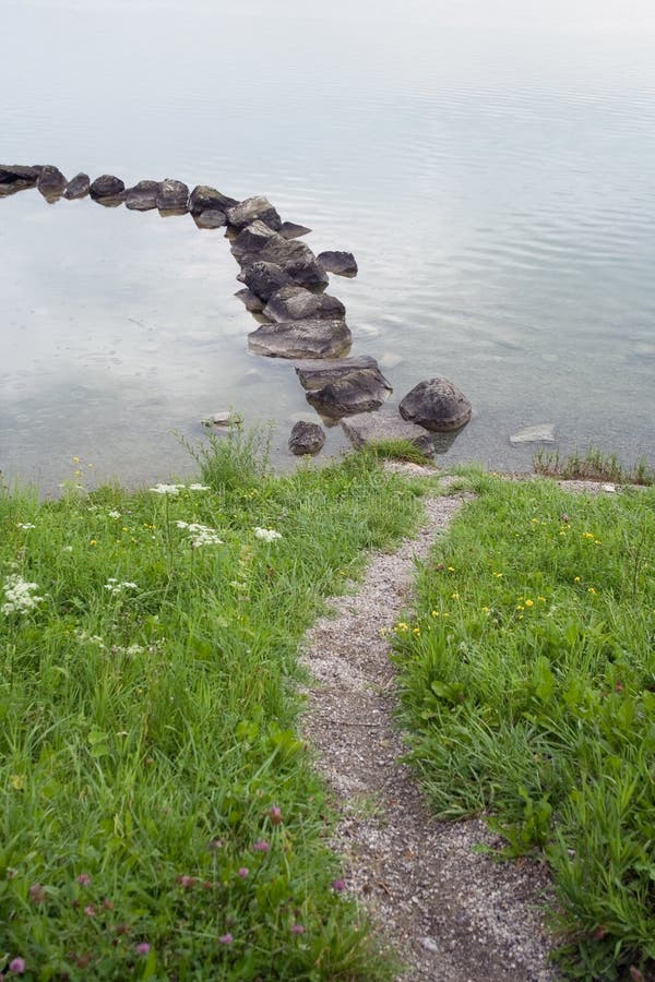 Path grass water stones stock image. Image of contrast - 6029105