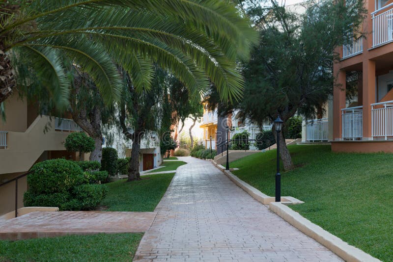 Path between the houses stock image. Image of gardening - 86108475