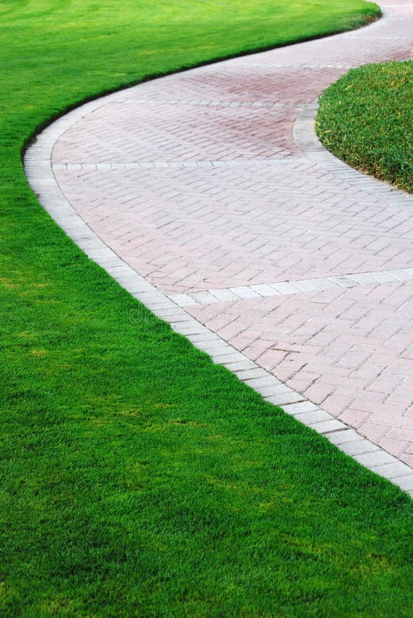 Path through a lawn stock image. Image of lane, brick - 6345797