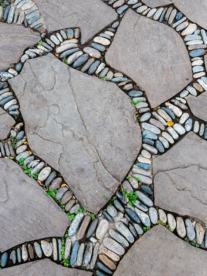 The Path is Lined with Large and Small Stones. Sidewalk Decorated with ...