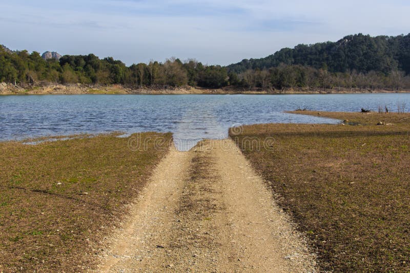 The Path that is Lost between the Water in the Bottom Stock Photo ...
