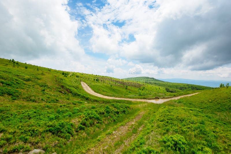 Path through Mountain Landscape. Road through Green Rolling Hills Stock ...