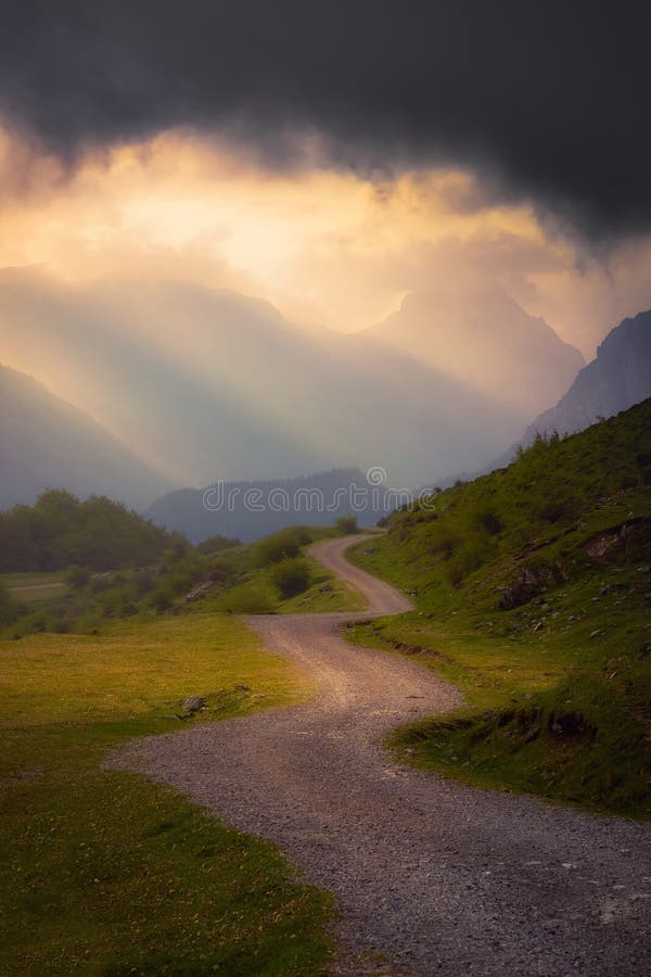 Path in the Mountains at Sunset Stock Photo - Image of beams, sunbeams ...