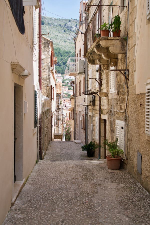 Path in an old town stock photo. Image of unesco, building - 155534618
