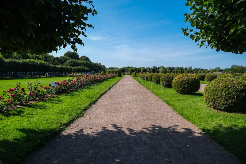 A Path in a Park with a Blue Sky Above Stock Photo - Image of green ...