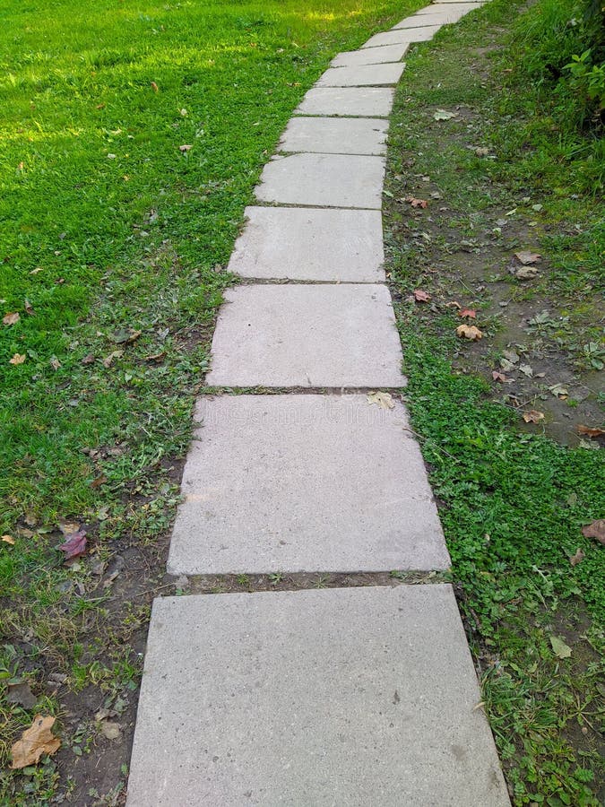 Path in the Park is Made of Concrete Square Slabs Stock Photo - Image ...