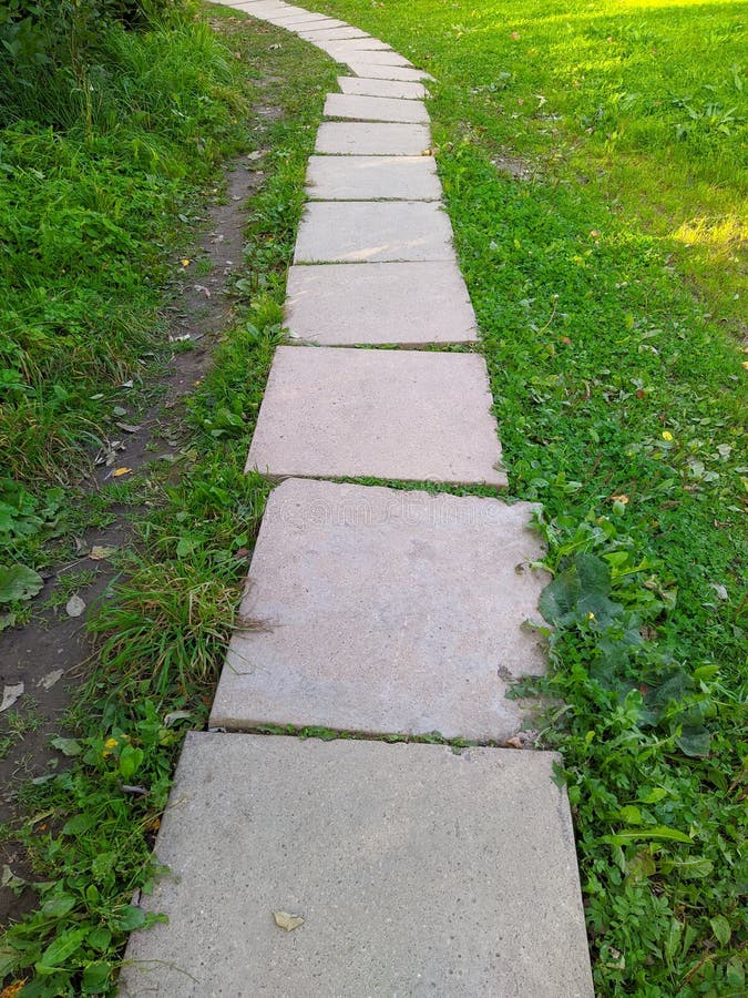 Path in the Park is Made of Concrete Square Slabs Stock Image - Image ...