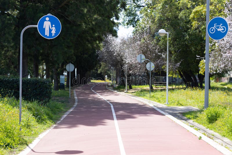 A Path in the Park - Signs Indicating the Path for a Bicycle and a ...