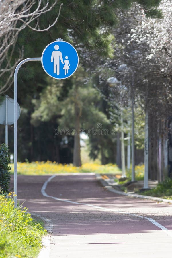 A Path in the Park - Signs Indicating the Path for a Parent with a ...