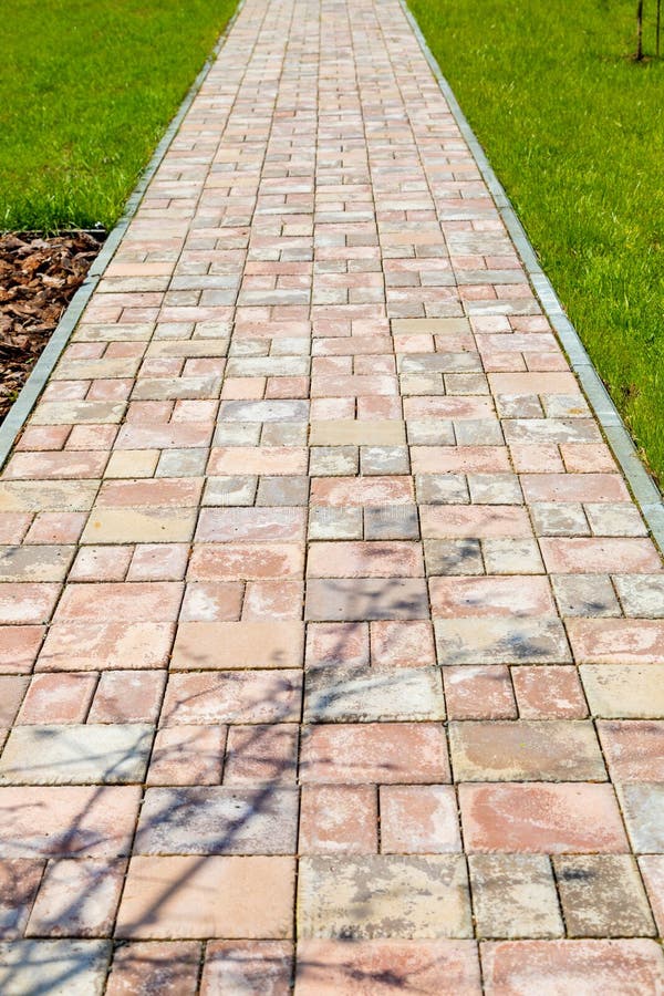 The Path is Paved with Clinker Tiles Stock Photo - Image of tiled ...
