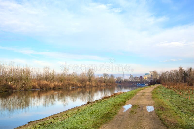 Path by the Shore of a River in the Italian Countryside in Winter Stock ...