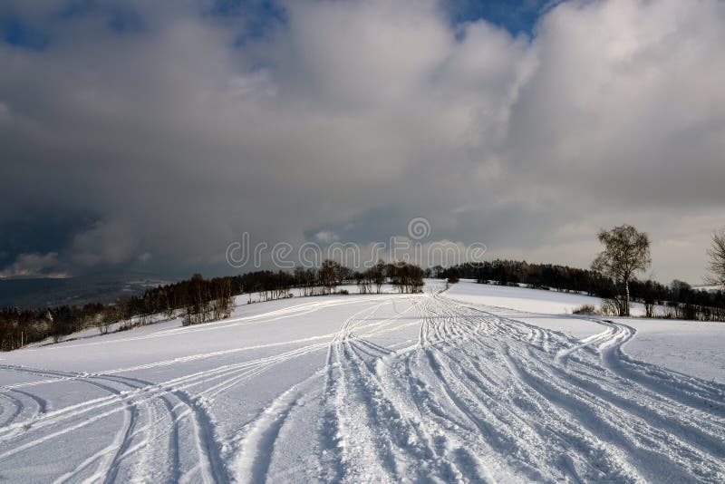 Path in snowy sunny day stock image. Image of trees, mountains - 69091365