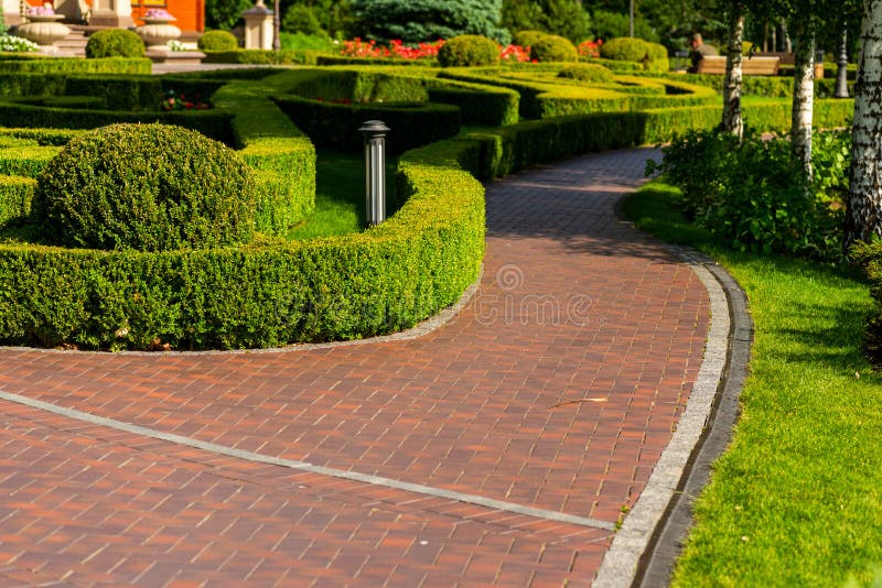 A Path of Tiles in a Landscape Design Stock Photo - Image of ornament ...