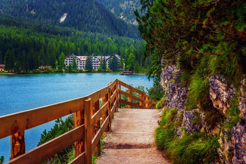 Path to the lake stock image. Image of alps, rock, fence - 78414967