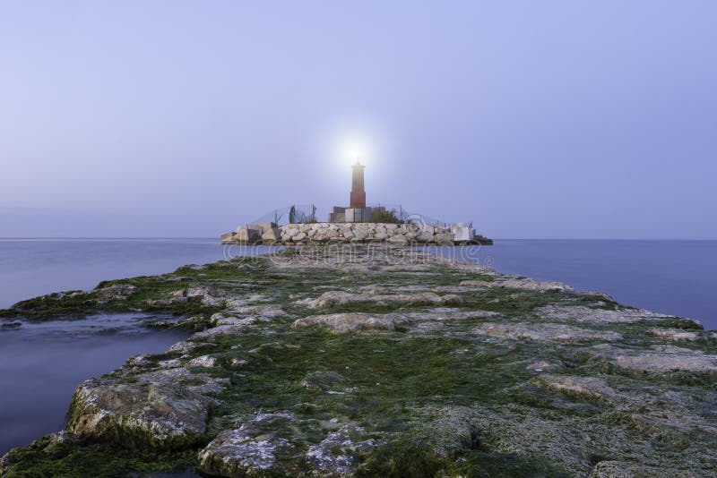 Path to the lighthouse stock photo. Image of water, seascape - 41400556