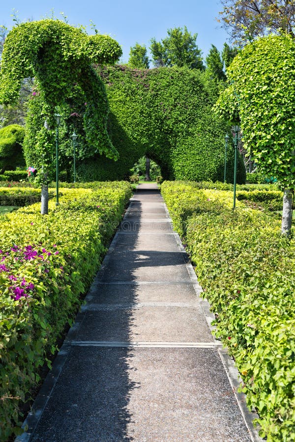 Path To the Manicured Bushes. Stock Photo - Image of landscape, house ...