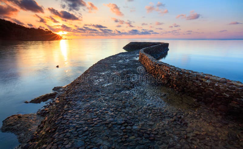 Path to the sea at sunset stock image. Image of motion - 64114589