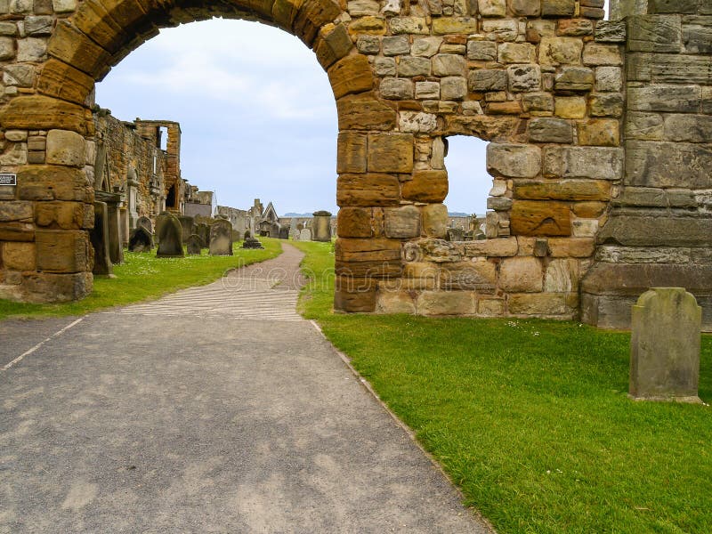 Path Under Stone Arch in Perimeter Wall of Graveyard Stock Image ...