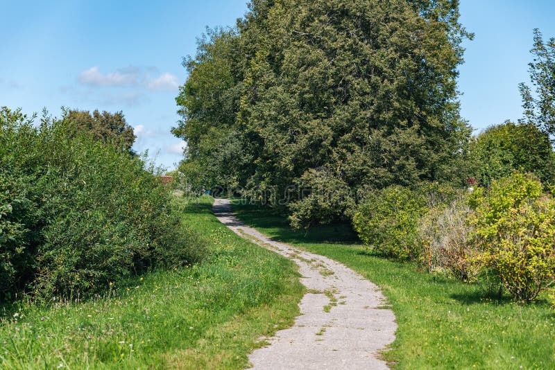 Path Winding through a Beautifully Landscaped Park. the Path is Framed ...