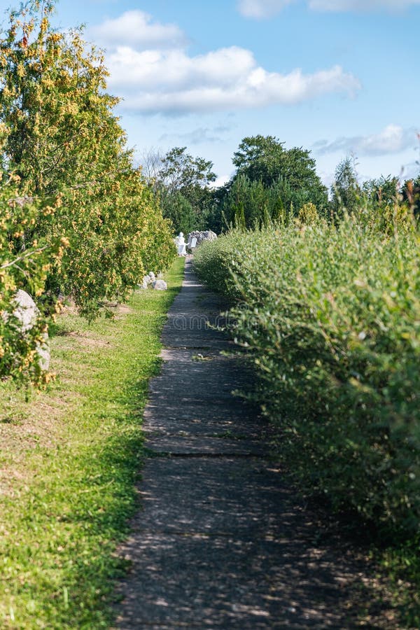 Path Winding through a Beautifully Landscaped Park. the Path is Framed ...