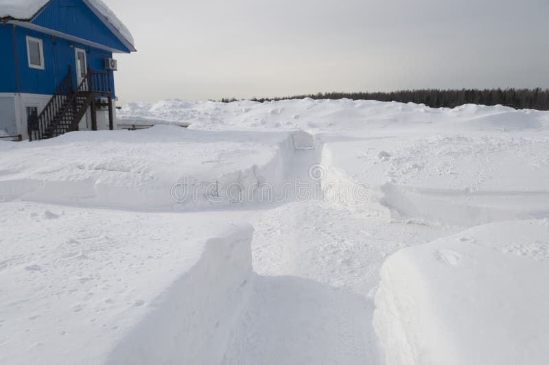 Paths made in deep snow stock photo. Image of country - 24624154