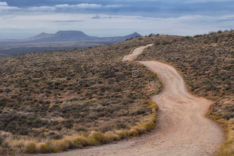 Pathway through an Arid Land Stock Image - Image of stone, desert ...
