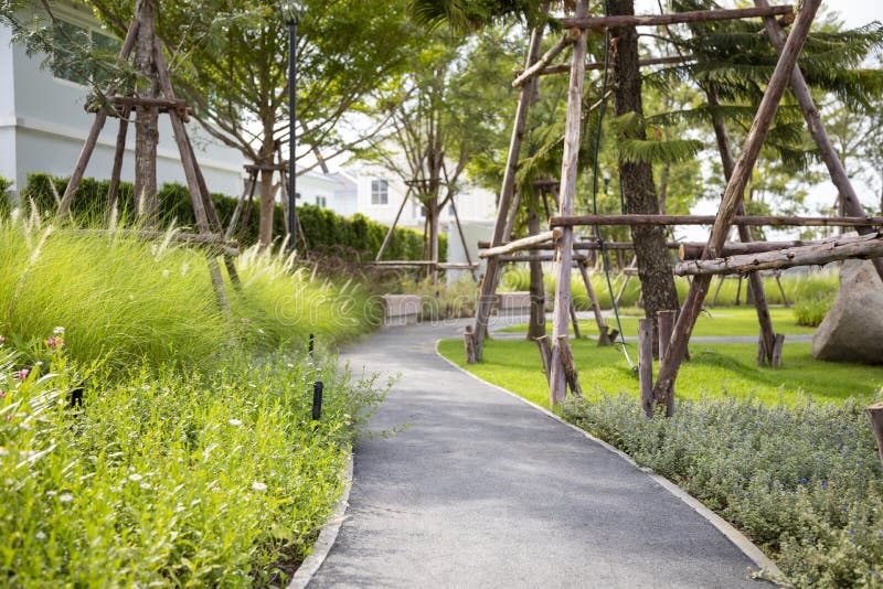 Pathway Curving through Lawn with Green Grass. Stock Photo - Image of ...