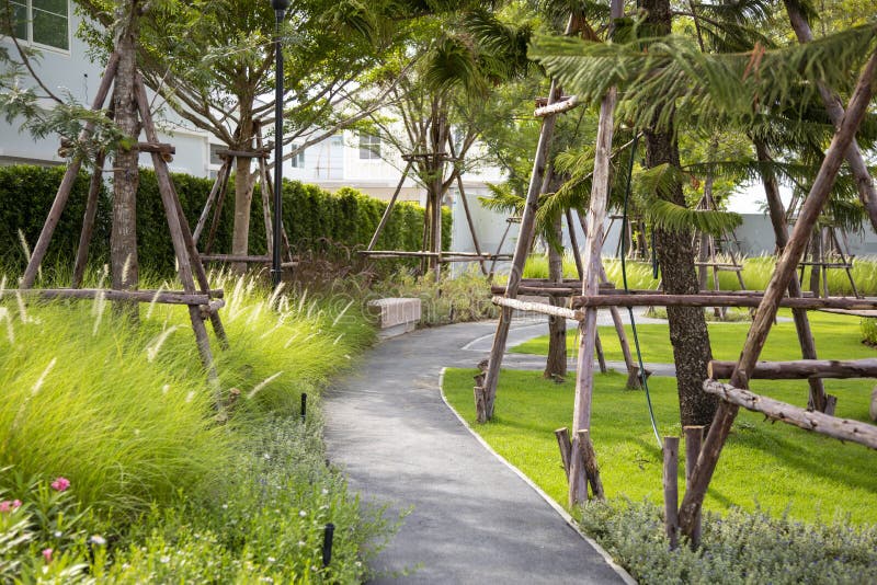 Pathway Curving through Lawn with Green Grass. Stock Photo - Image of ...