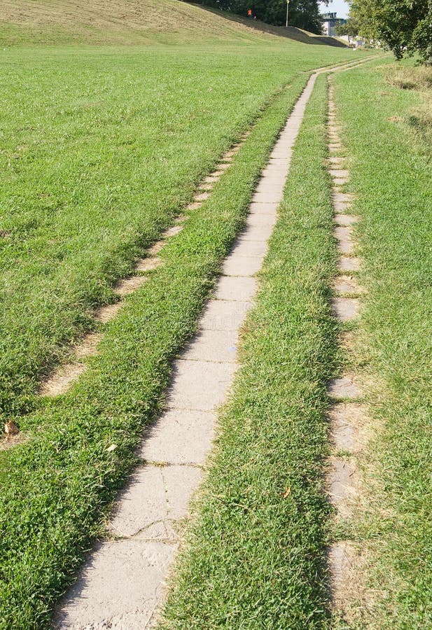 Pathway through the grass stock photo. Image of park - 13485284