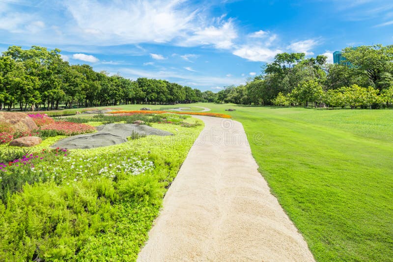 Pathway in Green Grass Field in Big City Park Stock Photo - Image of ...